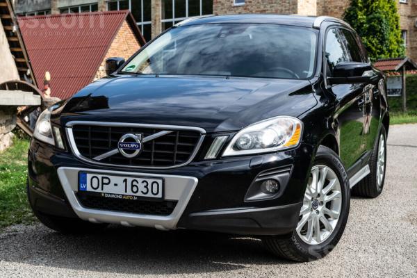 Black Volvo XC60 2010 in Tukums, with an engine capacity of 2.40 L and mileage of 270 thousand km for 8290 €, photo 3 on AUTOMOTO.COM.LV