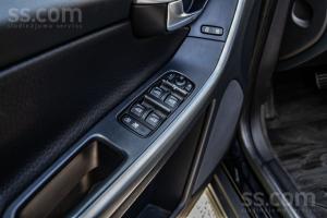 Black Volvo XC60 2010 in Tukums, with an engine capacity of 2.40 L and mileage of 270 thousand km for 8290 €, photo 23 on AUTOMOTO.COM.LV