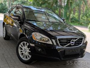 Black Volvo XC60 2010 in Riga, with an engine capacity of 2.40 L and mileage of 0 thousand km for 7990 €, photo 8 on AUTOMOTO.COM.LV