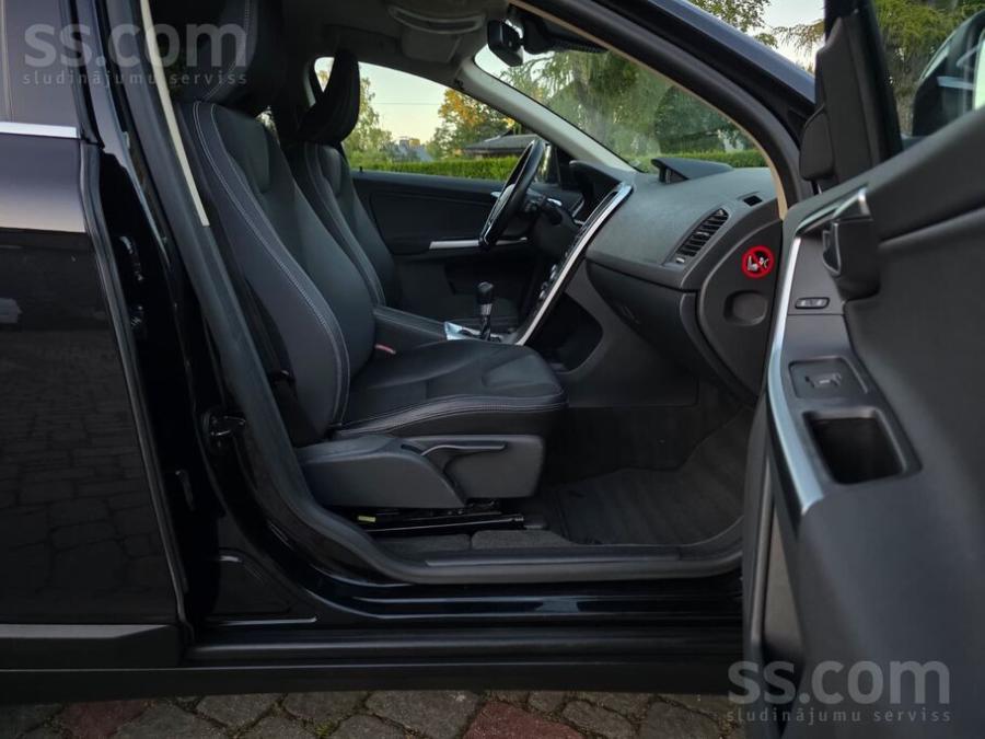 Black Volvo XC60 2010 in Riga, with an engine capacity of 2.40 L and mileage of 306 thousand km for 7950 €, photo 19 on AUTOMOTO.COM.LV