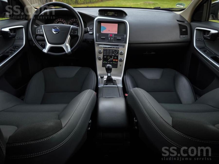 Black Volvo XC60 2010 in Riga, with an engine capacity of 2.40 L and mileage of 306 thousand km for 7950 €, photo 22 on AUTOMOTO.COM.LV