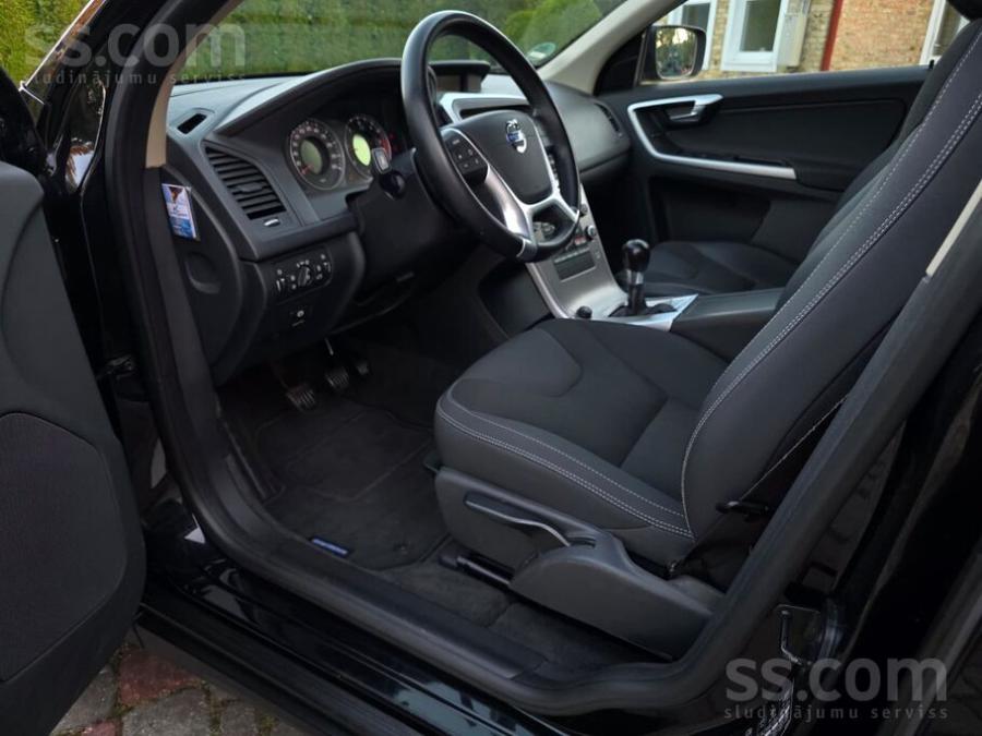 Black Volvo XC60 2010 in Riga, with an engine capacity of 2.40 L and mileage of 306 thousand km for 7950 €, photo 23 on AUTOMOTO.COM.LV