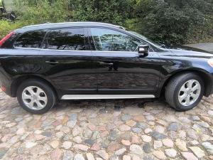 Black Volvo XC60 2010 in Utena, with an engine capacity of 2.40 L and mileage of 241 thousand km for 7450 €, photo 7 on AUTOMOTO.COM.LV