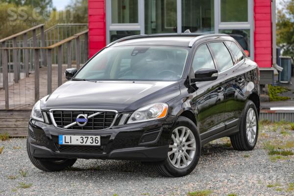 Black Volvo XC60 2010 in Riga, with an engine capacity of 2.40 L and mileage of 360 thousand km for 6990 €, photo 1 on AUTOMOTO.COM.LV