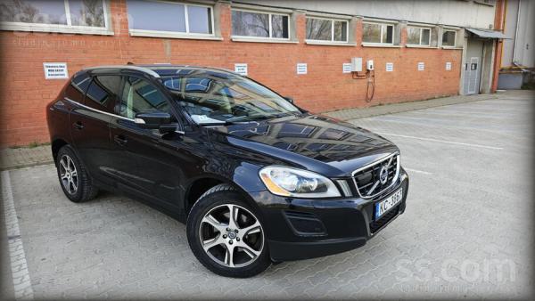 Black Volvo XC60 2011 in Riga, with an engine capacity of 2.40 L and mileage of 290 thousand km for 6500 €, photo 1 on AUTOMOTO.COM.LV