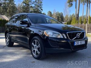 Black Volvo XC60 2011 in Riga, with an engine capacity of 2.40 L and mileage of 305 thousand km for 9450 €, photo 7 on AUTOMOTO.COM.LV