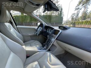 Black Volvo XC60 2011 in Riga, with an engine capacity of 2.40 L and mileage of 305 thousand km for 9450 €, photo 25 on AUTOMOTO.COM.LV