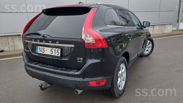 Black Volvo XC60 2011 in Riga, with an engine capacity of 2.40 L and mileage of 257 thousand km for 10990 €, photo 5 on AUTOMOTO.COM.LV