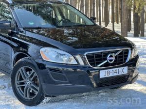 Black Volvo XC60 2011 in Daugavpils, with an engine capacity of 2.40 L and mileage of 276 thousand km for 9400 €, photo 7 on AUTOMOTO.COM.LV