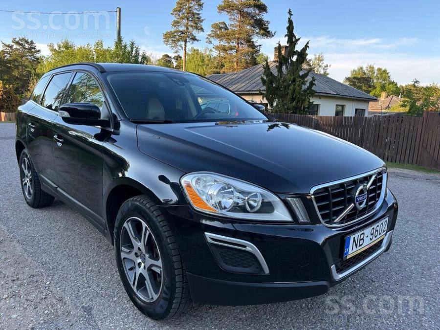 Black Volvo XC60 2011 in Riga, with an engine capacity of 2.40 L and mileage of 338 thousand km for 6200 €, photo 1 on AUTOMOTO.COM.LV
