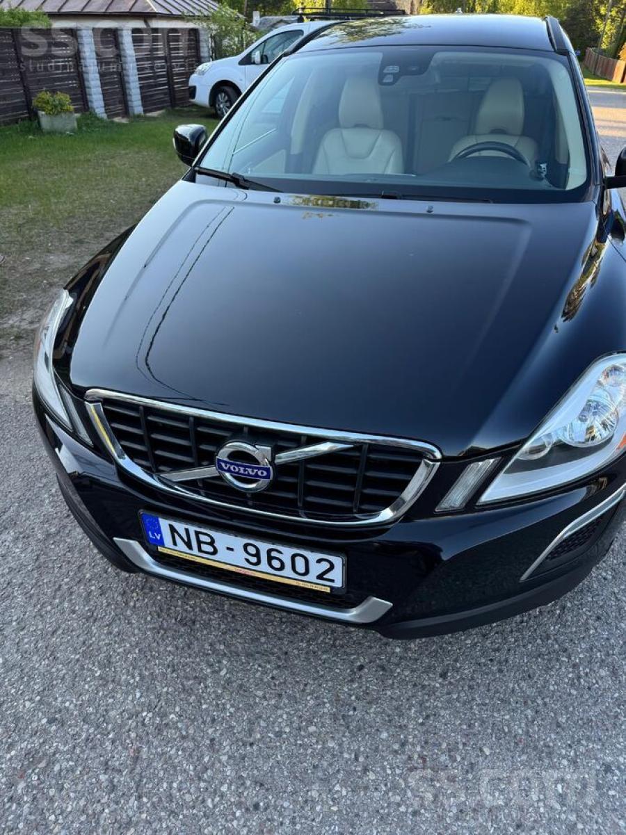 Black Volvo XC60 2011 in Riga, with an engine capacity of 2.40 L and mileage of 338 thousand km for 6200 €, photo 7 on AUTOMOTO.COM.LV