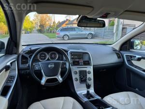 Black Volvo XC60 2011 in Riga, with an engine capacity of 2.40 L and mileage of 338 thousand km for 6200 €, photo 13 on AUTOMOTO.COM.LV
