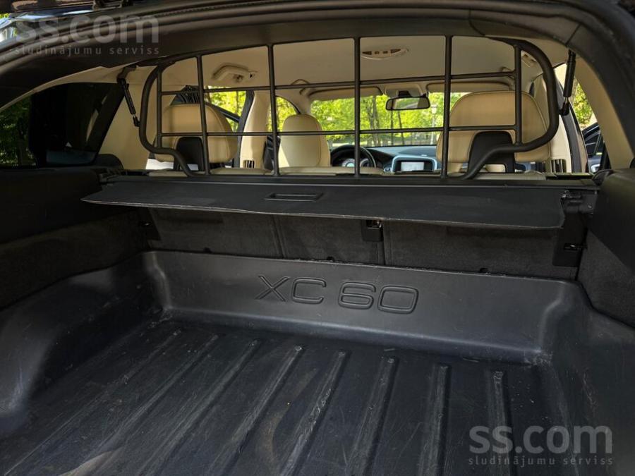 Black Volvo XC60 2011 in Riga, with an engine capacity of 2.40 L and mileage of 338 thousand km for 6200 €, photo 22 on AUTOMOTO.COM.LV