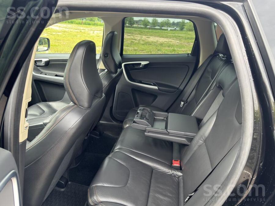 Black Volvo XC60 2011 in Rezekne, with an engine capacity of 2.40 L and mileage of 264 thousand km for 9700 €, photo 15 on AUTOMOTO.COM.LV