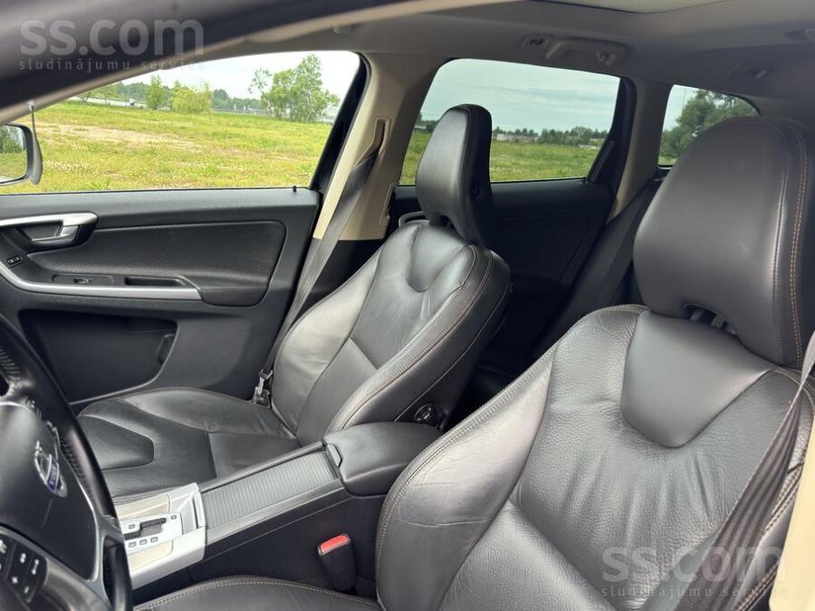 Black Volvo XC60 2011 in Rezekne, with an engine capacity of 2.40 L and mileage of 264 thousand km for 9700 €, photo 20 on AUTOMOTO.COM.LV