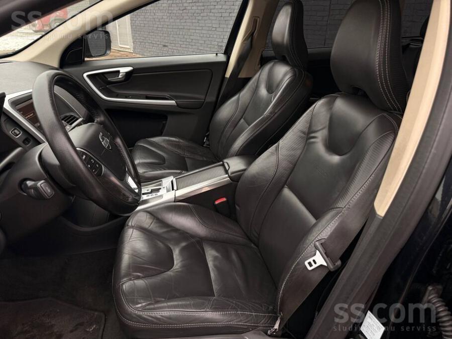 Black Volvo XC60 2011 in Daugavpils, with an engine capacity of 2.40 L and mileage of 285 thousand km for 9700 €, photo 12 on AUTOMOTO.COM.LV