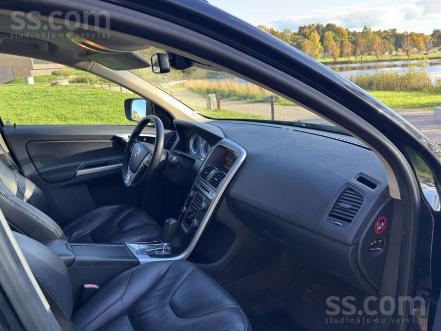 Black Volvo XC60 2011 in Rezekne, with an engine capacity of 2.00 L and mileage of 315 thousand km for 8900 €, photo 14 on AUTOMOTO.COM.LV