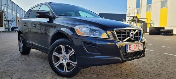 Black Volvo XC60 2011 in Riga, with an engine capacity of 2.40 L and mileage of 247 thousand km for 10200 €, photo 5 on AUTOMOTO.COM.LV