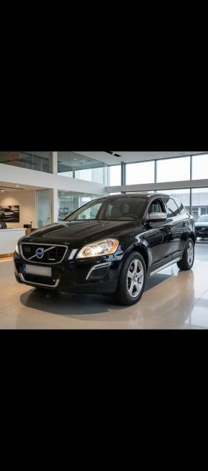 Black Volvo XC60 2011 in Jurmala, with an engine capacity of 2.40 L and mileage of 331 thousand km for 10950 €, photo  on AUTOMOTO.COM.LV