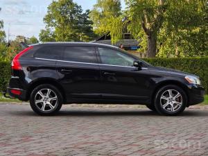Black Volvo XC60 2011 in Riga, with an engine capacity of 2.40 L and mileage of 385 thousand km for 8950 €, photo 7 on AUTOMOTO.COM.LV
