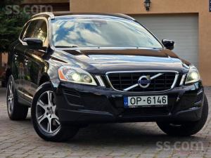 Black Volvo XC60 2011 in Riga, with an engine capacity of 2.40 L and mileage of 385 thousand km for 8950 €, photo 8 on AUTOMOTO.COM.LV