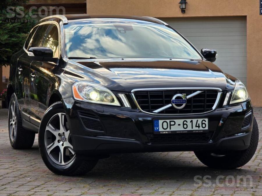 Black Volvo XC60 2011 in Riga, with an engine capacity of 2.40 L and mileage of 385 thousand km for 8950 €, photo 8 on AUTOMOTO.COM.LV