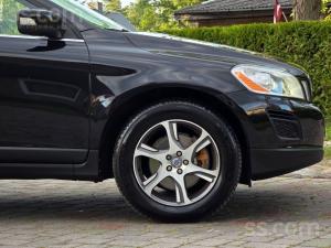 Black Volvo XC60 2011 in Riga, with an engine capacity of 2.40 L and mileage of 385 thousand km for 8950 €, photo 13 on AUTOMOTO.COM.LV