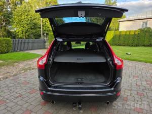 Black Volvo XC60 2011 in Riga, with an engine capacity of 2.40 L and mileage of 385 thousand km for 8950 €, photo 14 on AUTOMOTO.COM.LV