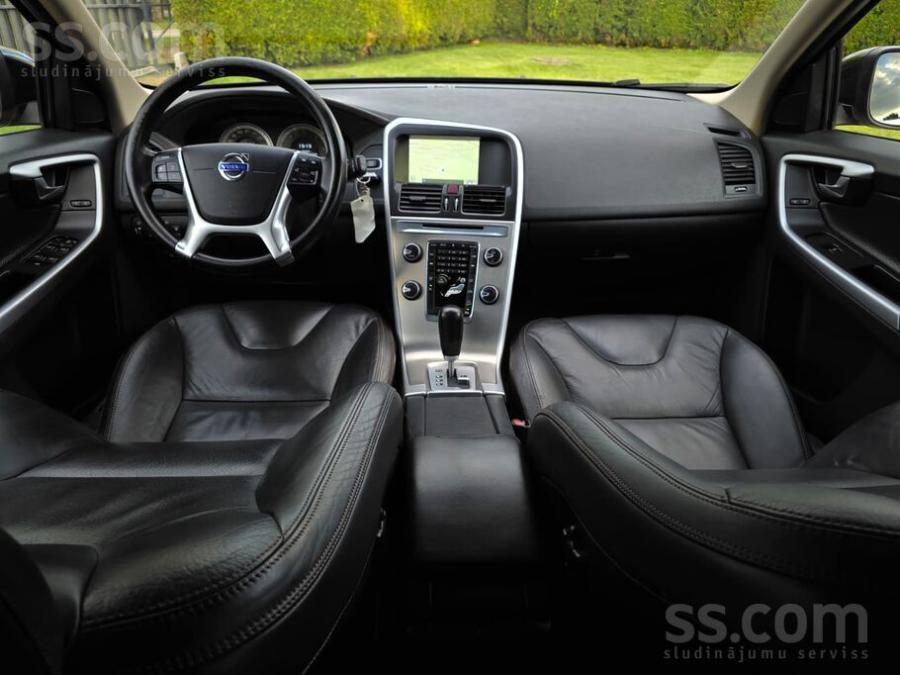 Black Volvo XC60 2011 in Riga, with an engine capacity of 2.40 L and mileage of 385 thousand km for 8950 €, photo 23 on AUTOMOTO.COM.LV
