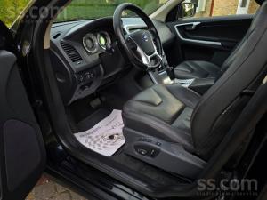 Black Volvo XC60 2011 in Riga, with an engine capacity of 2.40 L and mileage of 385 thousand km for 8950 €, photo 24 on AUTOMOTO.COM.LV