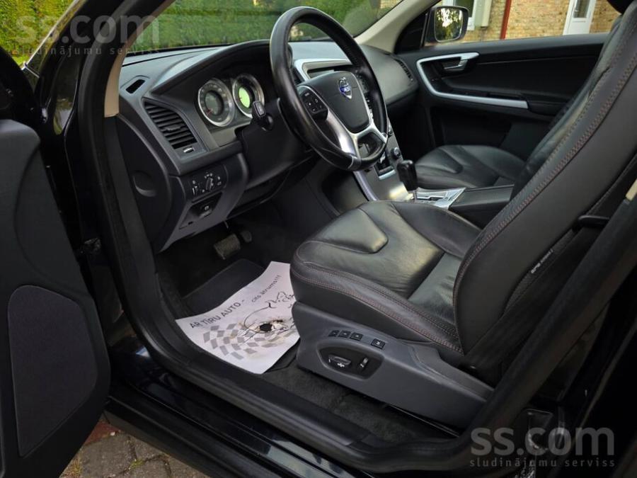 Black Volvo XC60 2011 in Riga, with an engine capacity of 2.40 L and mileage of 385 thousand km for 8950 €, photo 24 on AUTOMOTO.COM.LV