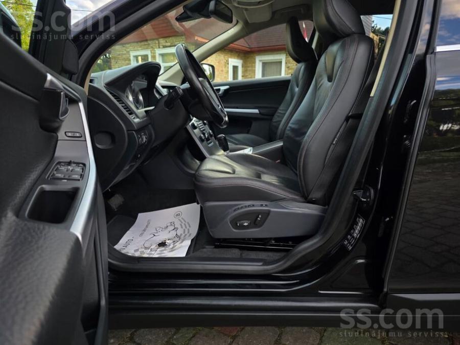 Black Volvo XC60 2011 in Riga, with an engine capacity of 2.40 L and mileage of 385 thousand km for 8950 €, photo 25 on AUTOMOTO.COM.LV