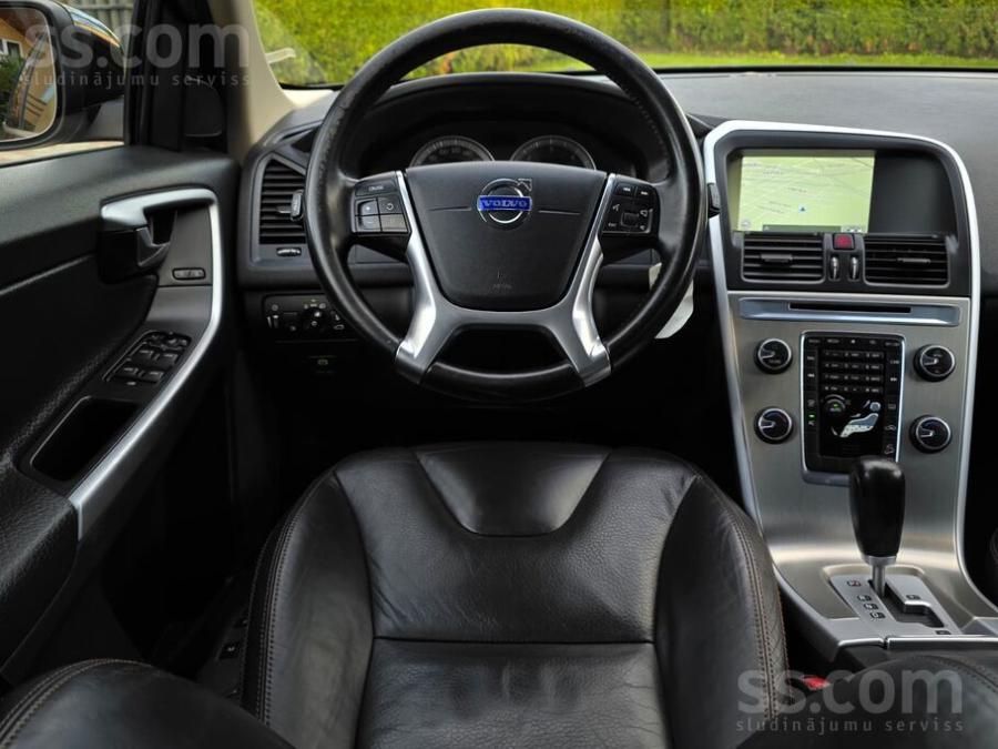 Black Volvo XC60 2011 in Riga, with an engine capacity of 2.40 L and mileage of 385 thousand km for 8950 €, photo 26 on AUTOMOTO.COM.LV