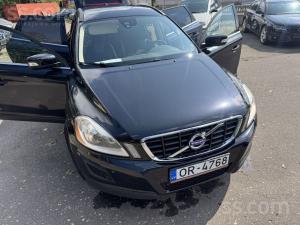 Black Volvo XC60 2011 in Riga, with an engine capacity of 2.00 L and mileage of 207 thousand km for 8750 €, photo  on AUTOMOTO.COM.LV