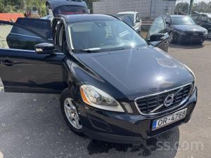 Black Volvo XC60 2011 in Riga, with an engine capacity of 2.00 L and mileage of 207 thousand km for 8750 €, photo 3 on AUTOMOTO.COM.LV