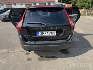 Black Volvo XC60 2011 in Riga, with an engine capacity of 2.00 L and mileage of 207 thousand km for 8750 €, photo 4 on AUTOMOTO.COM.LV