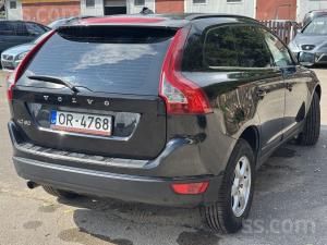 Black Volvo XC60 2011 in Riga, with an engine capacity of 2.00 L and mileage of 207 thousand km for 8750 €, photo 7 on AUTOMOTO.COM.LV