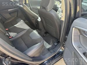 Black Volvo XC60 2011 in Riga, with an engine capacity of 2.00 L and mileage of 207 thousand km for 8750 €, photo 12 on AUTOMOTO.COM.LV