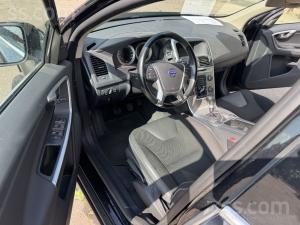 Black Volvo XC60 2011 in Riga, with an engine capacity of 2.00 L and mileage of 207 thousand km for 8750 €, photo 19 on AUTOMOTO.COM.LV