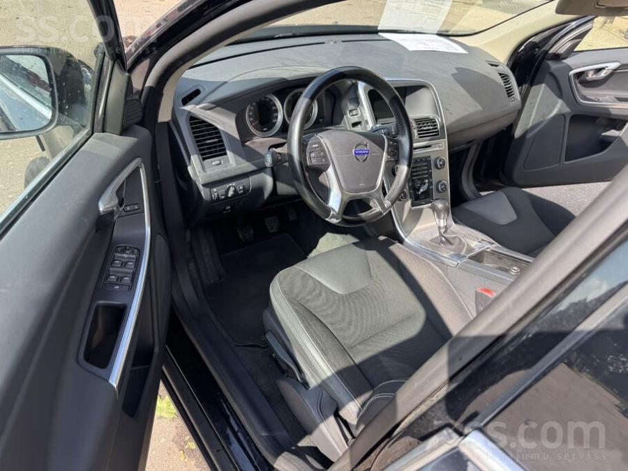 Black Volvo XC60 2011 in Riga, with an engine capacity of 2.00 L and mileage of 207 thousand km for 8750 €, photo 19 on AUTOMOTO.COM.LV