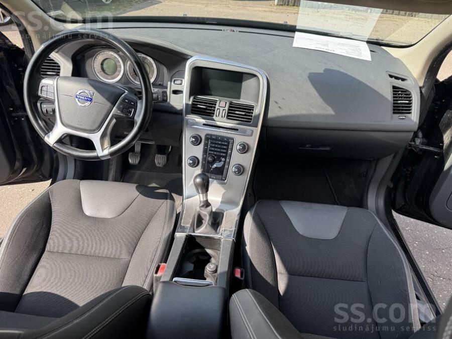 Black Volvo XC60 2011 in Riga, with an engine capacity of 2.00 L and mileage of 207 thousand km for 8750 €, photo 20 on AUTOMOTO.COM.LV
