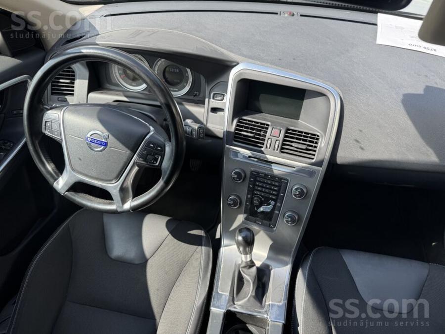 Black Volvo XC60 2011 in Riga, with an engine capacity of 2.00 L and mileage of 207 thousand km for 8750 €, photo 25 on AUTOMOTO.COM.LV