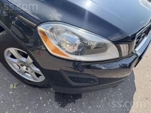 Black Volvo XC60 2011 in Riga, with an engine capacity of 2.00 L and mileage of 207 thousand km for 8750 €, photo 28 on AUTOMOTO.COM.LV