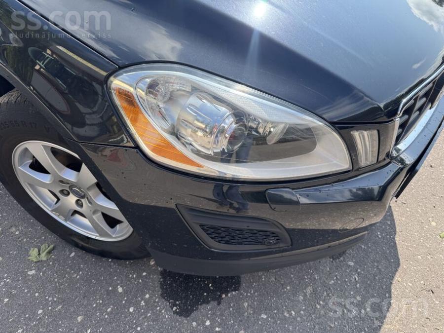 Black Volvo XC60 2011 in Riga, with an engine capacity of 2.00 L and mileage of 207 thousand km for 8750 €, photo 28 on AUTOMOTO.COM.LV