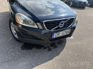 Black Volvo XC60 2011 in Riga, with an engine capacity of 2.00 L and mileage of 207 thousand km for 8750 €, photo 29 on AUTOMOTO.COM.LV