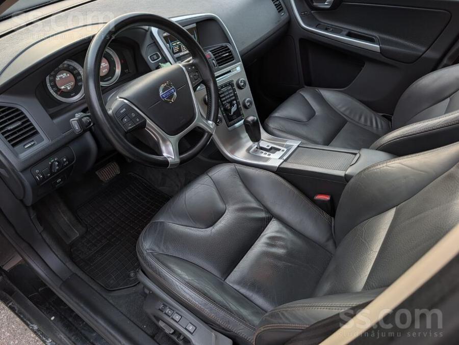 Black Volvo XC60 2011 in Jurmala, with an engine capacity of 2.40 L and mileage of 0 thousand km for 6450 €, photo 8 on AUTOMOTO.COM.LV