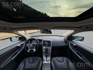 Black Volvo XC60 2011 in Jurmala, with an engine capacity of 2.40 L and mileage of 0 thousand km for 6450 €, photo 14 on AUTOMOTO.COM.LV