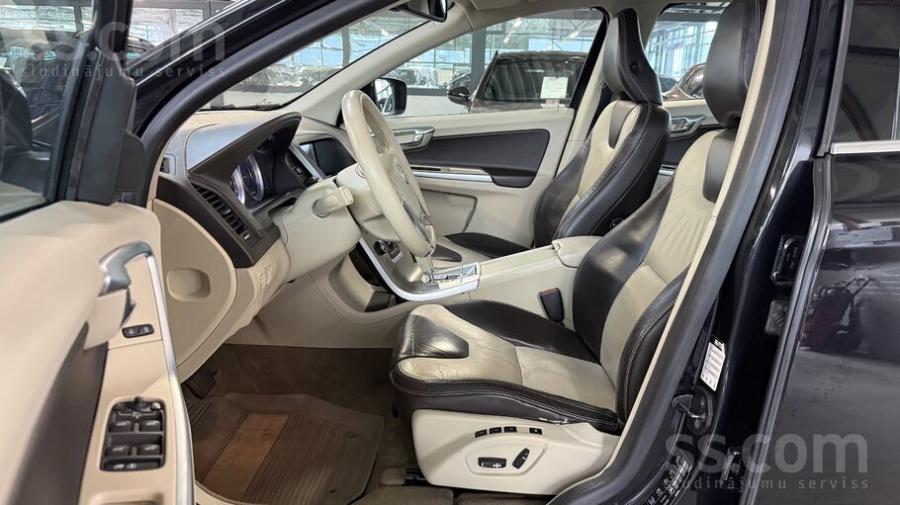 Black Volvo XC60 2011 in Riga, with an engine capacity of 2.40 L and mileage of 262 thousand km for 6500 €, photo 13 on AUTOMOTO.COM.LV