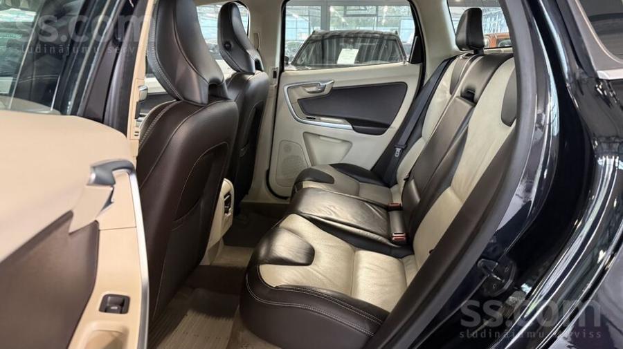 Black Volvo XC60 2011 in Riga, with an engine capacity of 2.40 L and mileage of 262 thousand km for 6500 €, photo 16 on AUTOMOTO.COM.LV