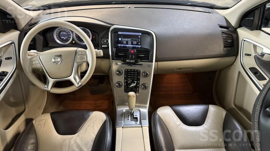 Black Volvo XC60 2011 in Riga, with an engine capacity of 2.40 L and mileage of 262 thousand km for 6500 €, photo 21 on AUTOMOTO.COM.LV